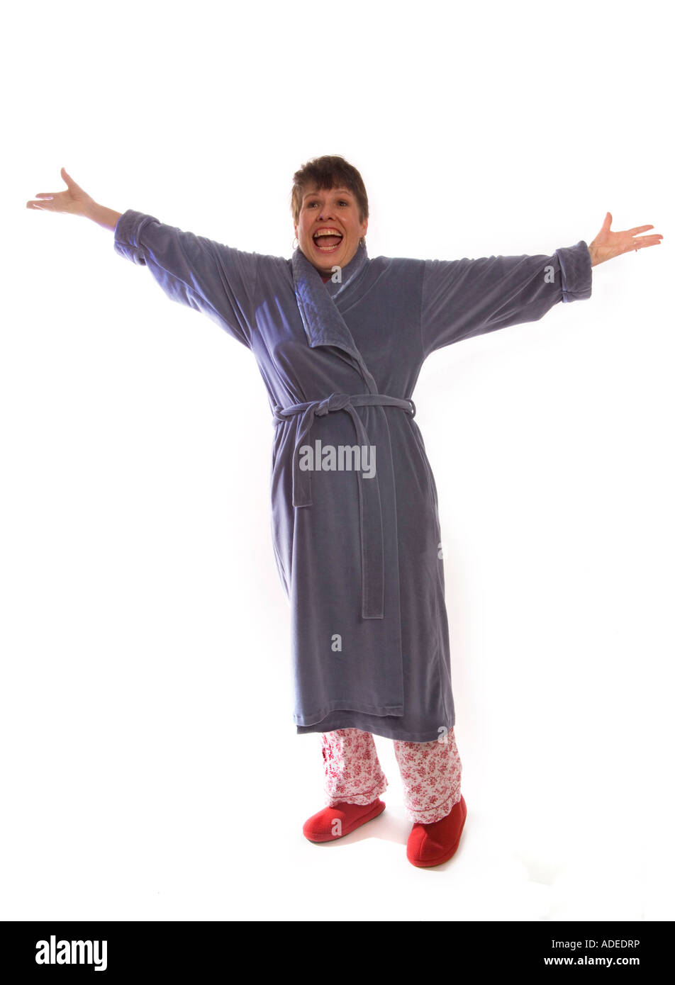 Happy woman in bath robe Stock Photo - Alamy