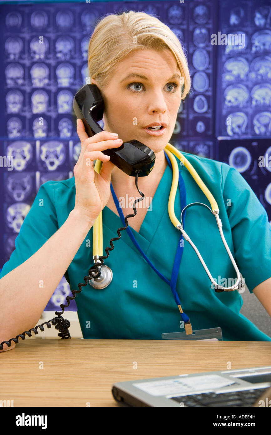 Nurse explains diagnosis to patient on the phone Stock Photo - Alamy