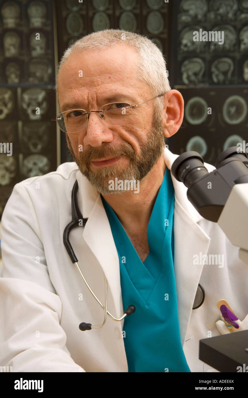 Brain Researcher using microscope Stock Photo - Alamy