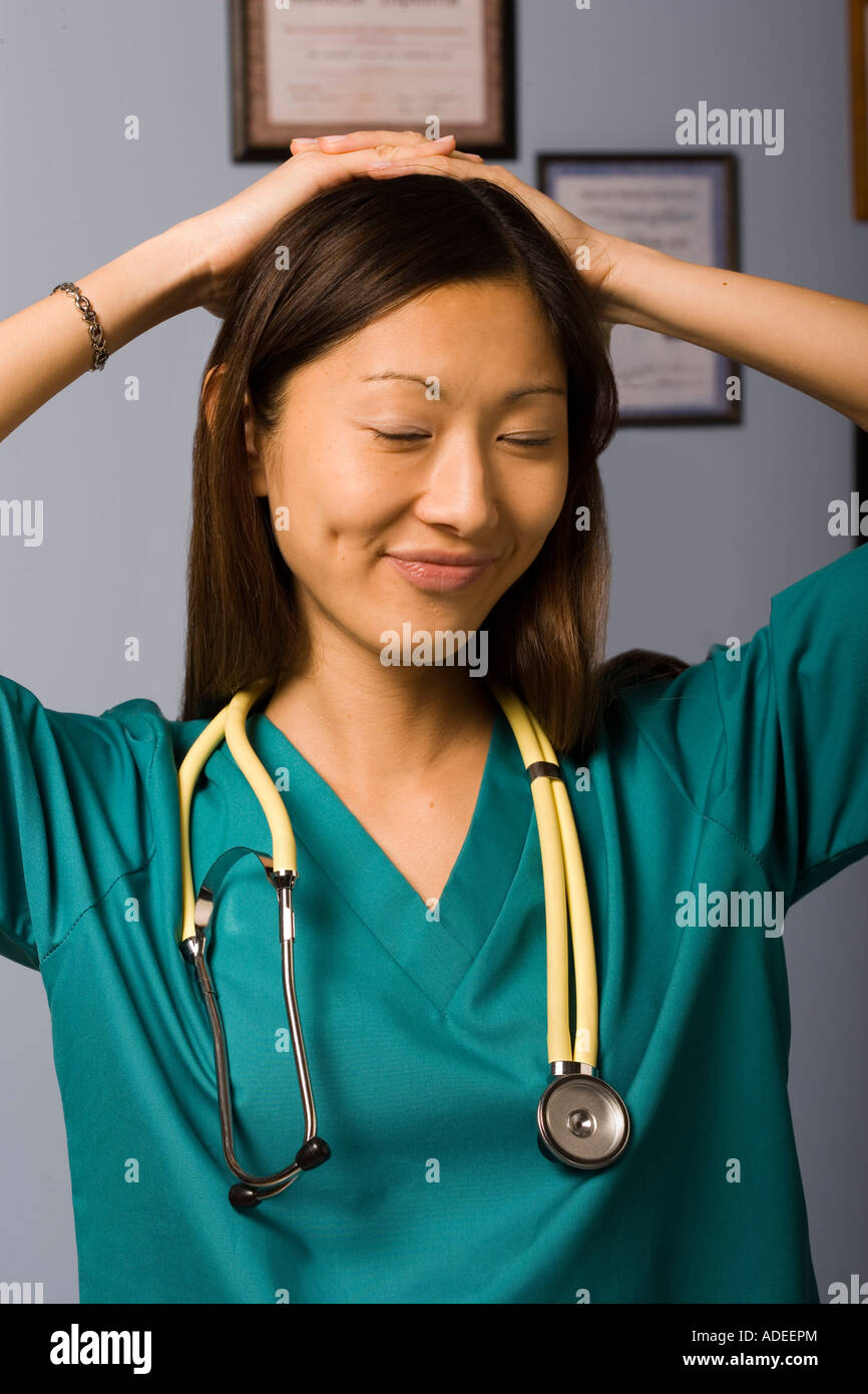 Happy nurse in the doctor's office Stock Photo - Alamy