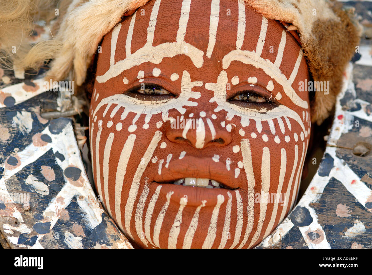 Close up portrait of Kikuyu dancer with traditionally painted face ...