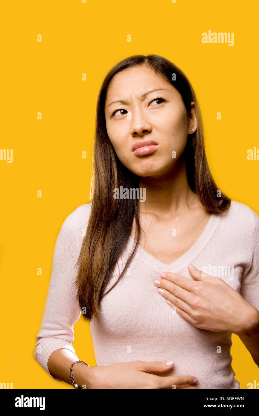 Woman experiencing abdominal pain Stock Photo - Alamy