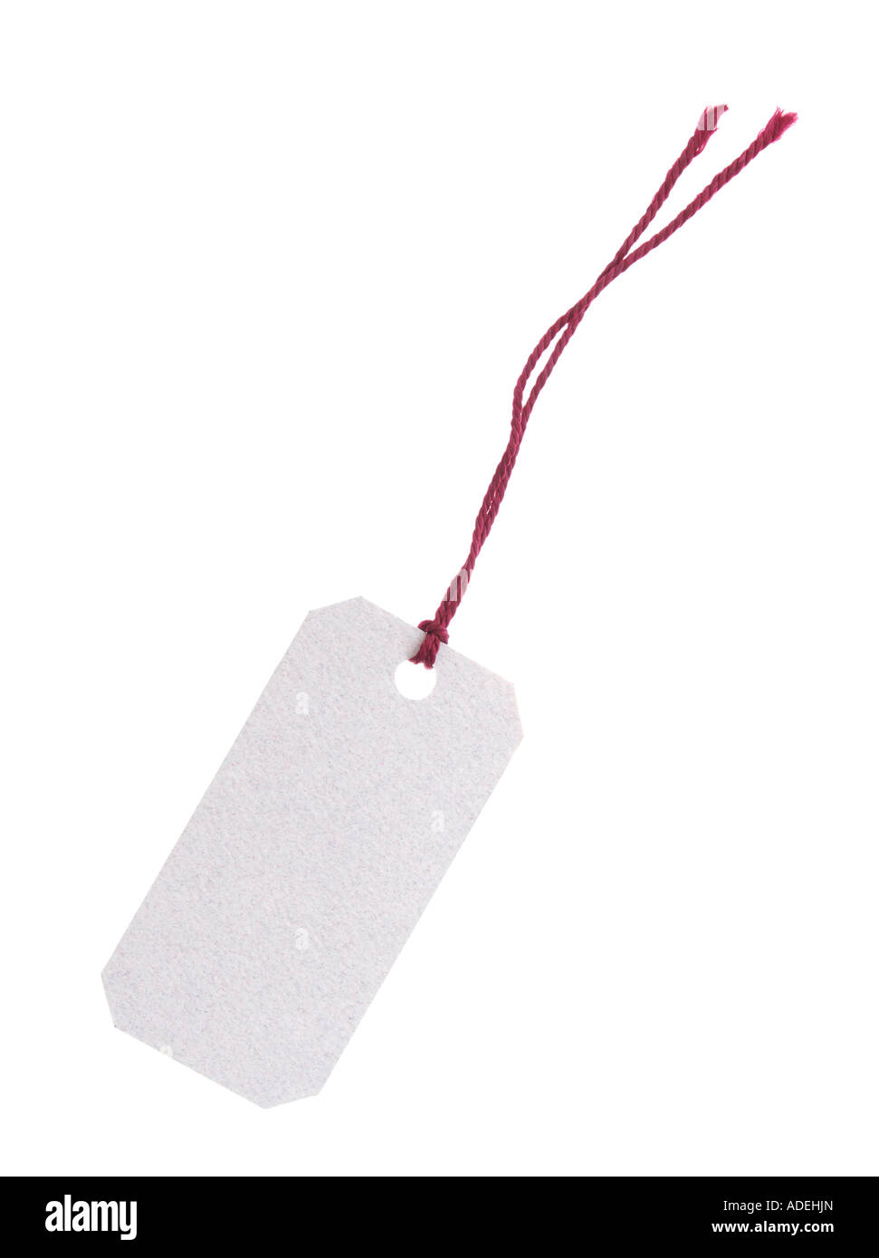 tag with red thread isolated on white background Clipping Path included ...