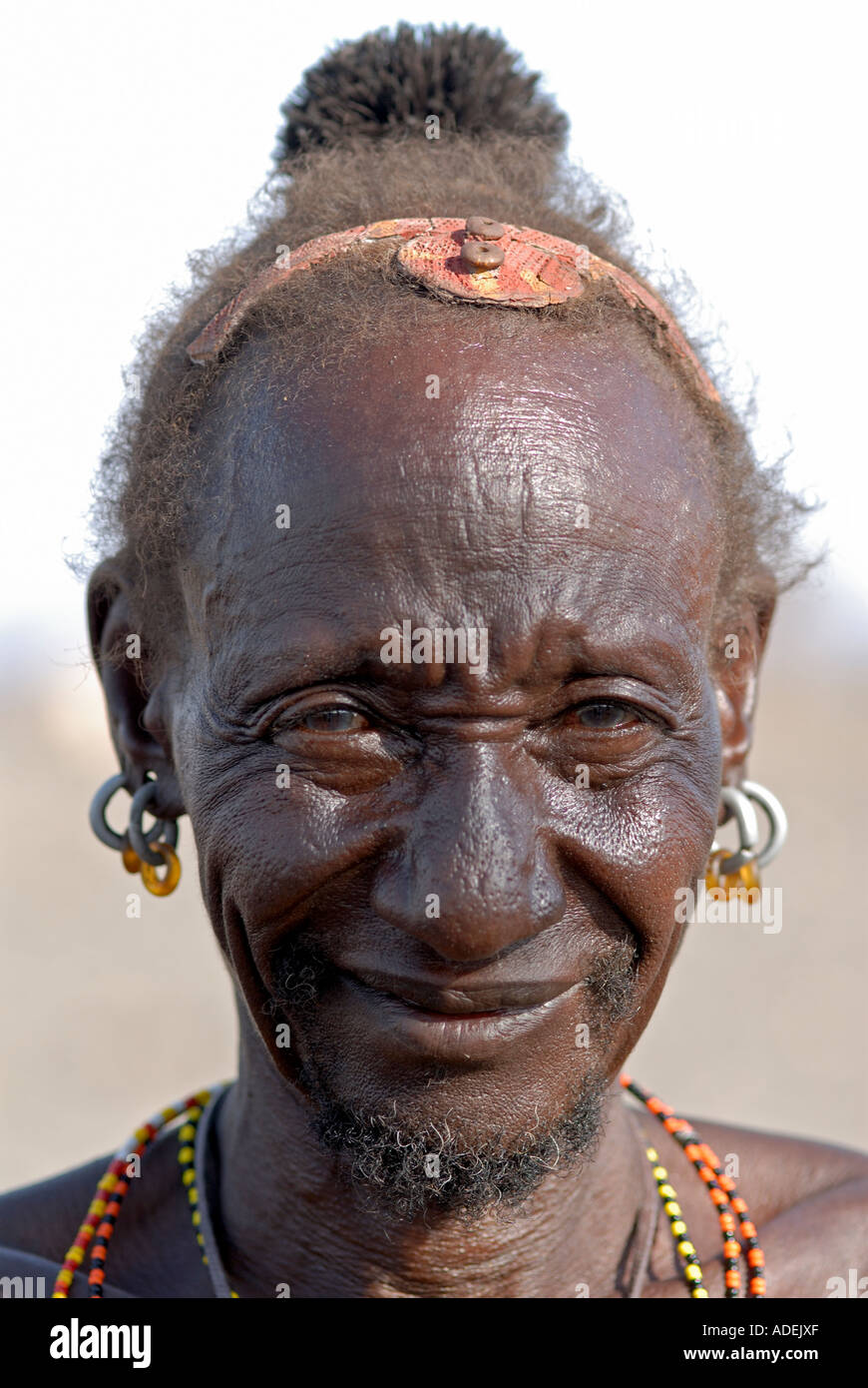 Turkana medicine man wearing clay hairdo and tribal ornaments Northern ...