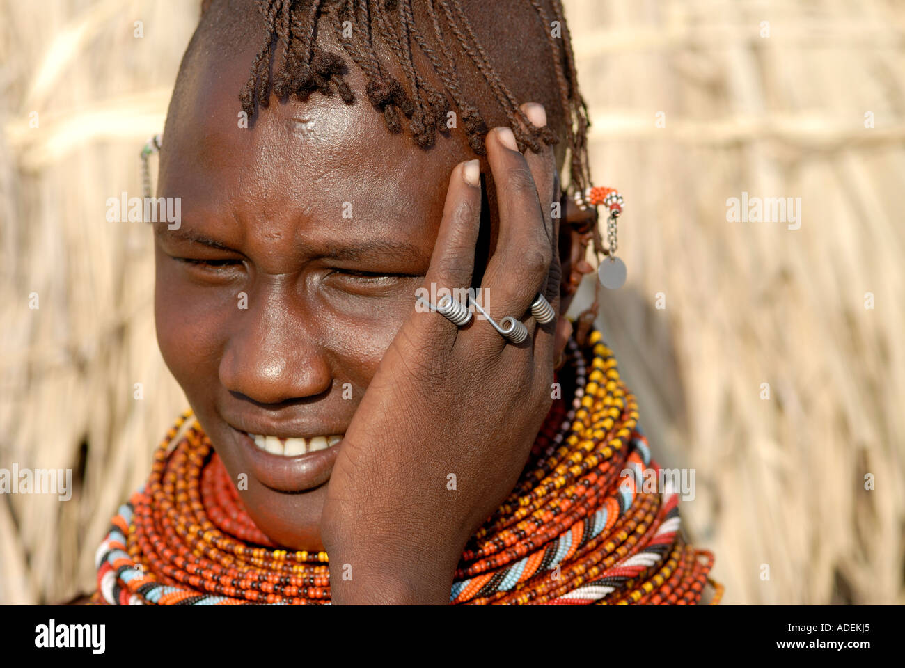 Turkana girl wearing traditional hairstyle and bead necklaces Northern ...