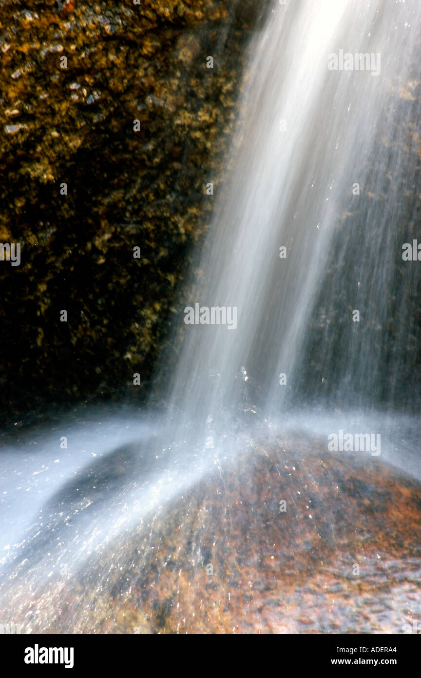 stream water falling onto granite rocks Stock Photo - Alamy