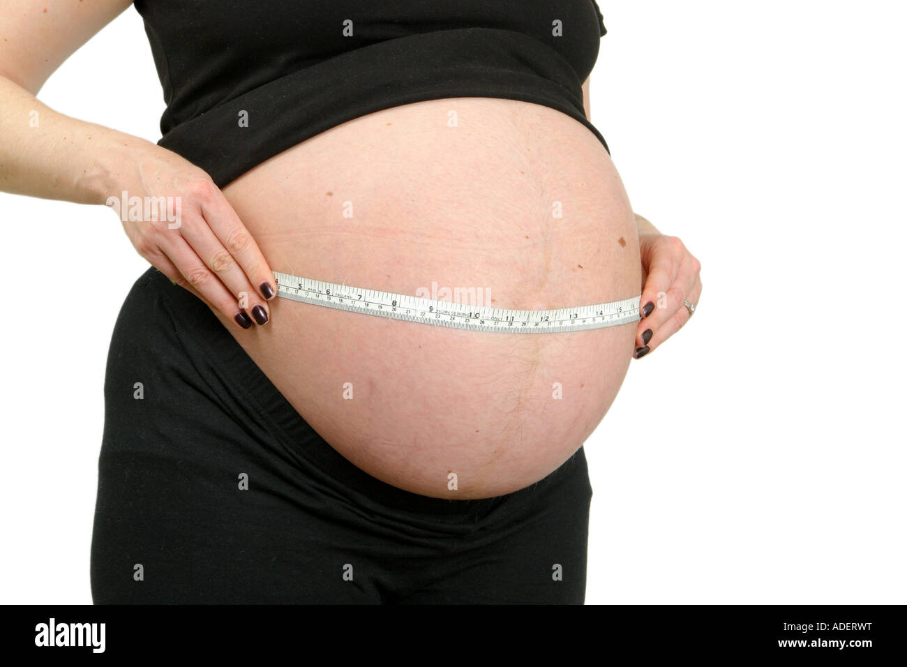 Pregnant woman showing big belly hi-res stock photography and images ...