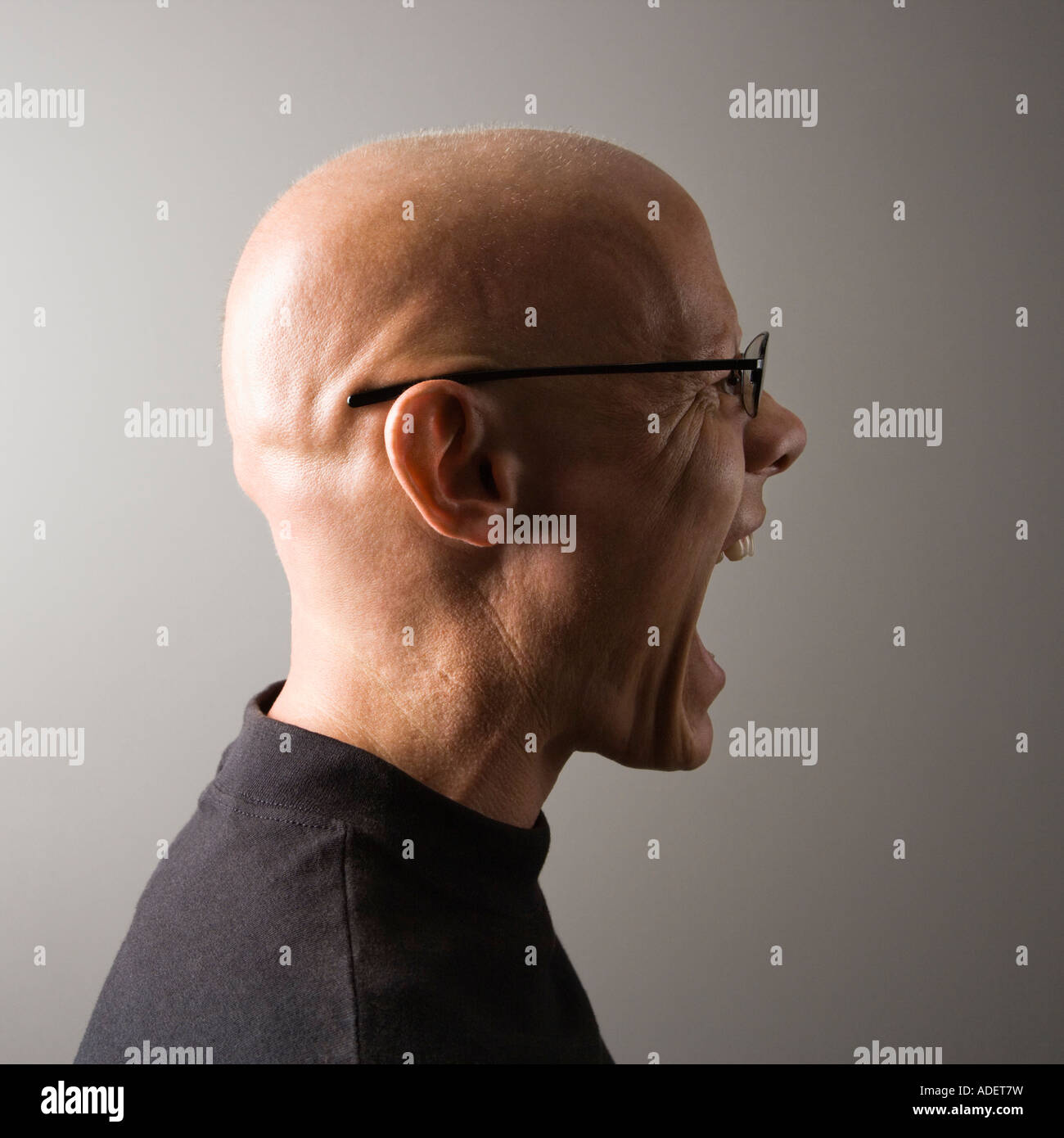 Profile portrait of mid adult Caucasian male screaming Stock Photo - Alamy