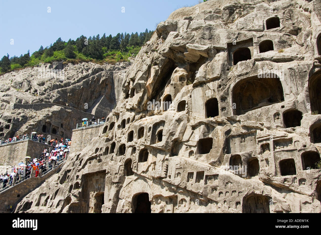 Dragon gate grottoes or longmen caves hi-res stock photography and ...
