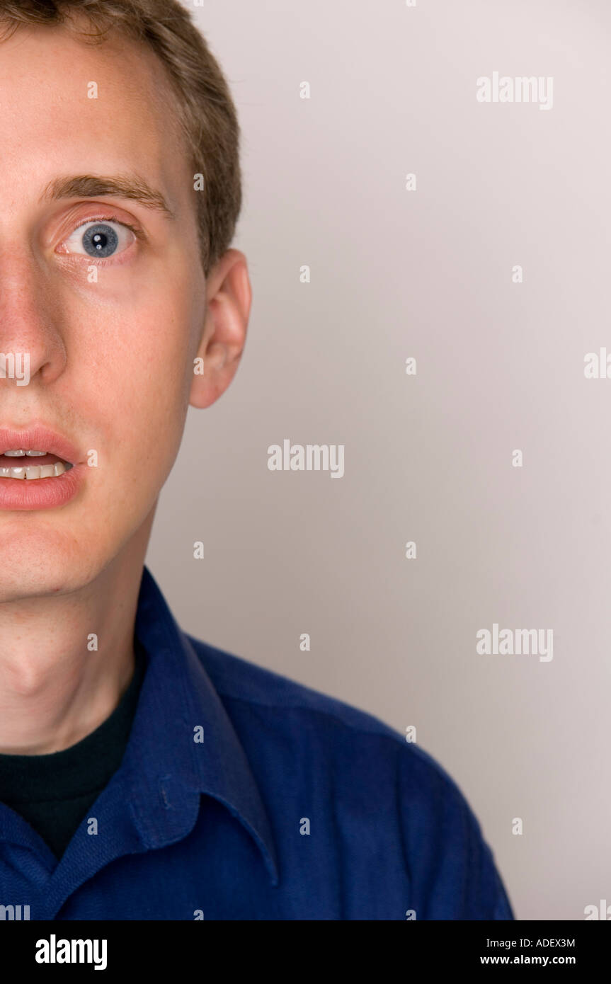 Tight crop of half a face of a scared man Stock Photo - Alamy