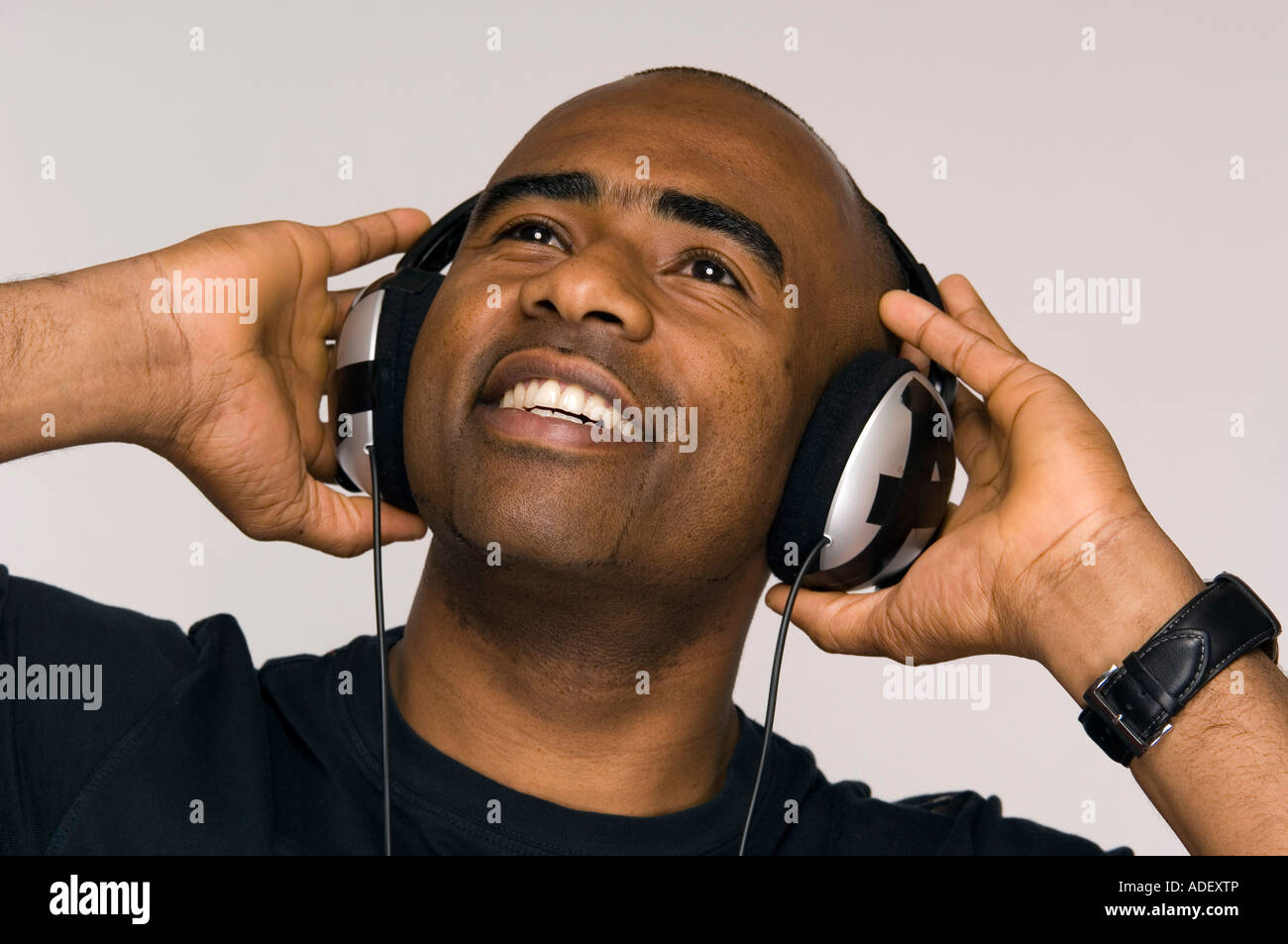 African listen hi-res stock photography and images - Alamy