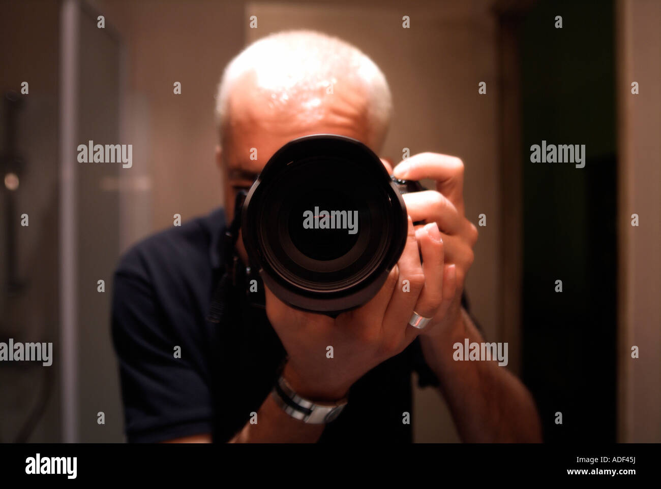 Self-portrait in a looking glass Stock Photo - Alamy