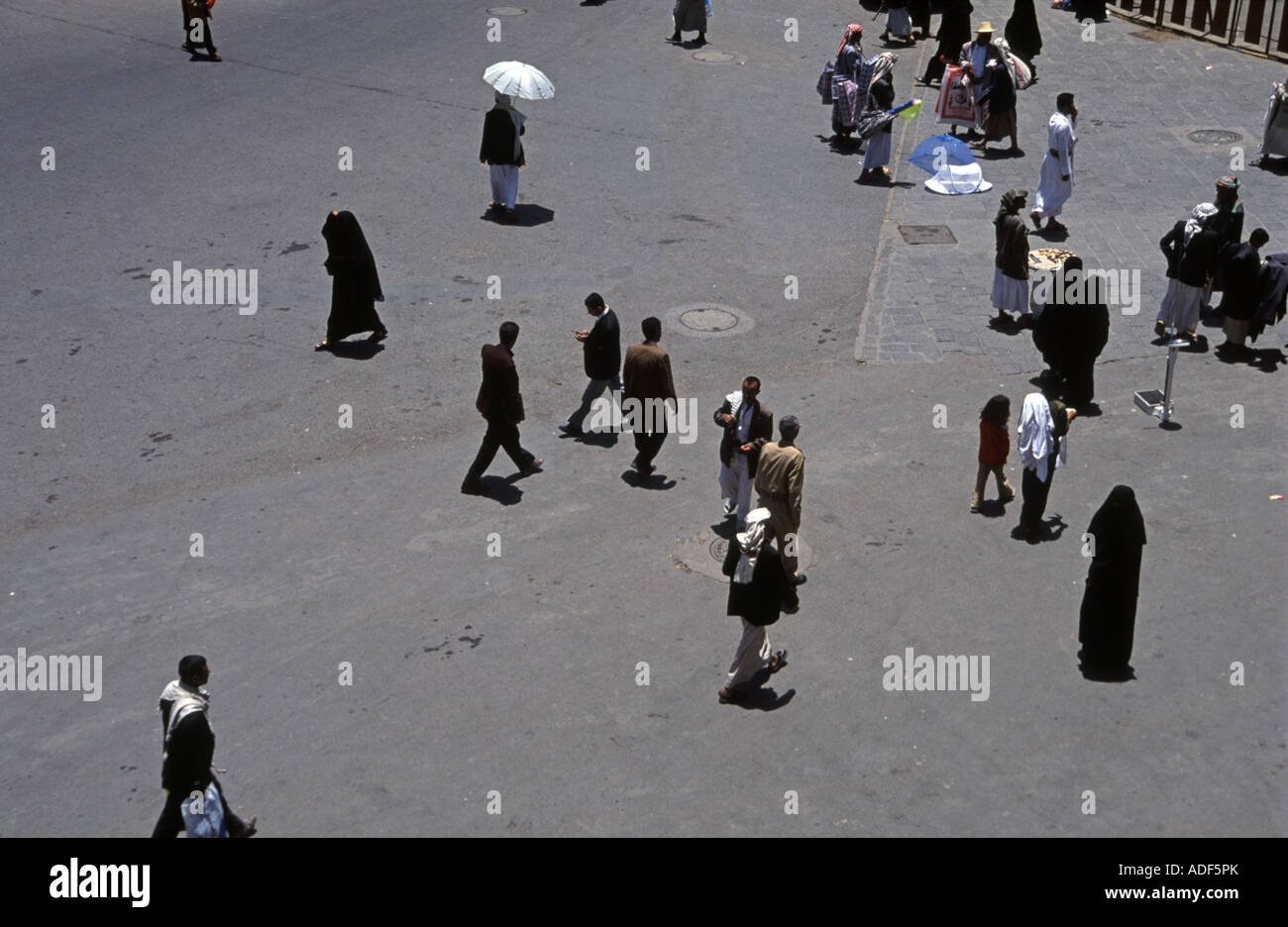 Overhead view of people at the entrance to Souq al Milh, the market in ...