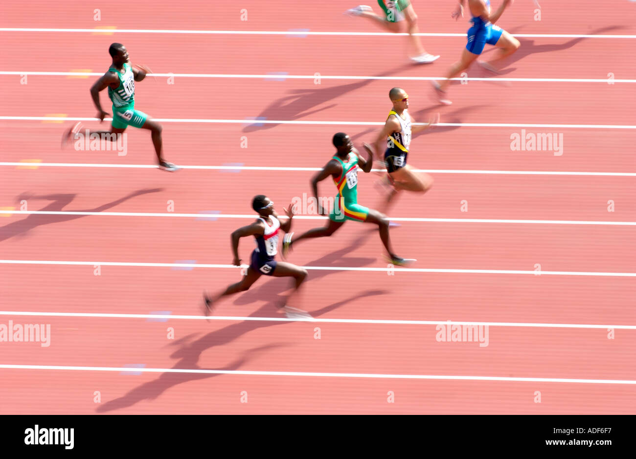 sprinters speeding down the track towards the finish line Stock Photo ...