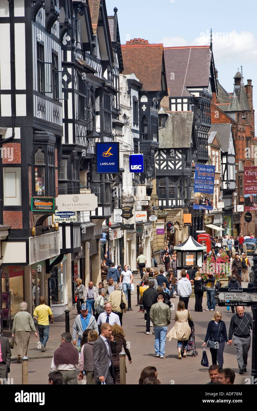 Shoppers in Eastgate Street in the historic city of Chester the ...