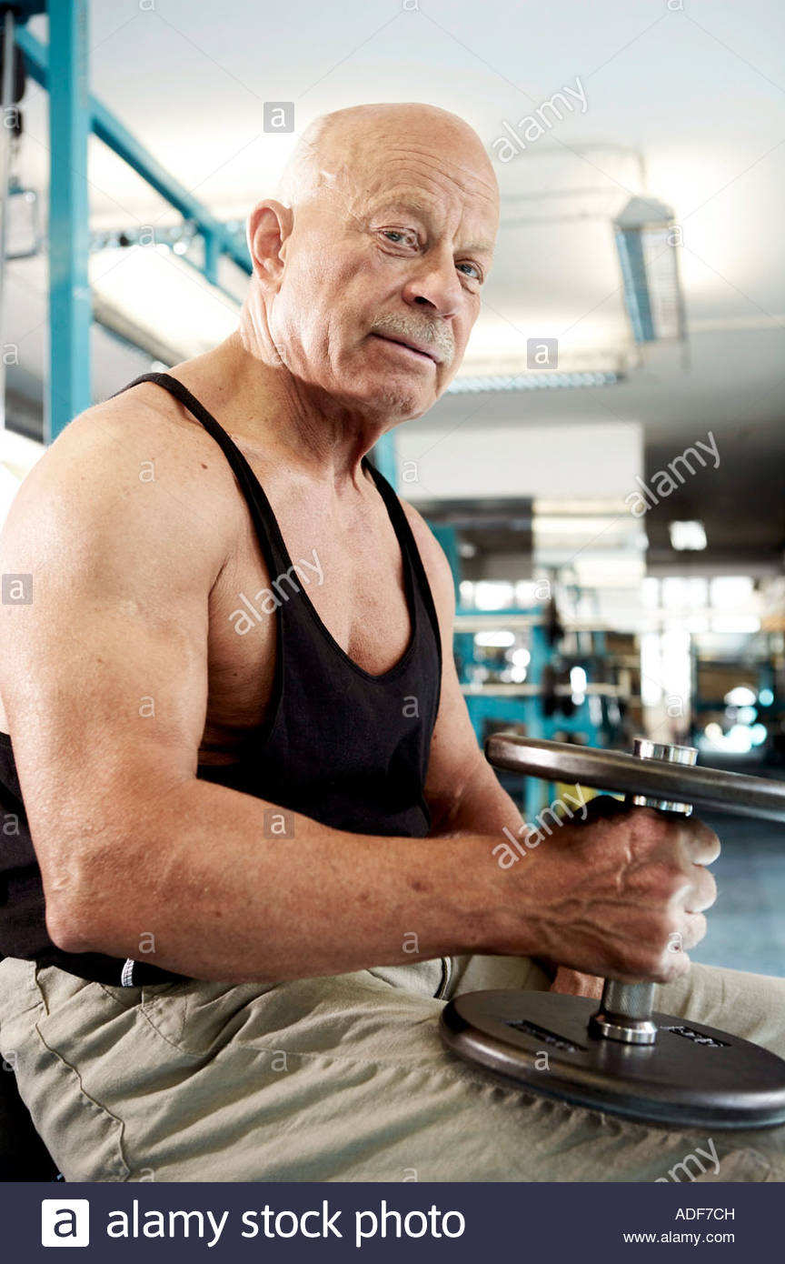 Senior doing bodybuilding Stock Photo: 13402624 - Alamy