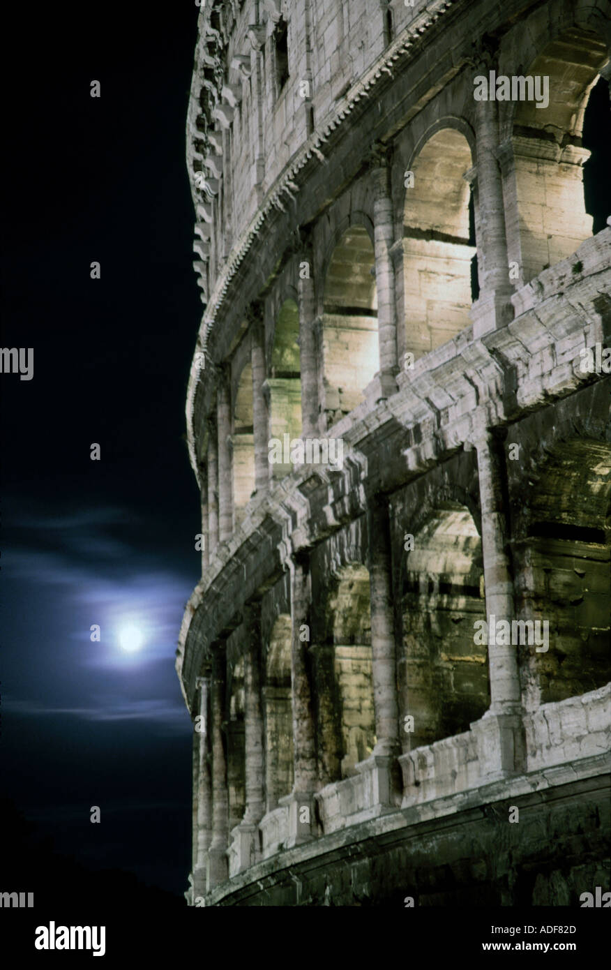 A full moon rises over the Roman Colosseum in Rome Italy Stock Photo ...