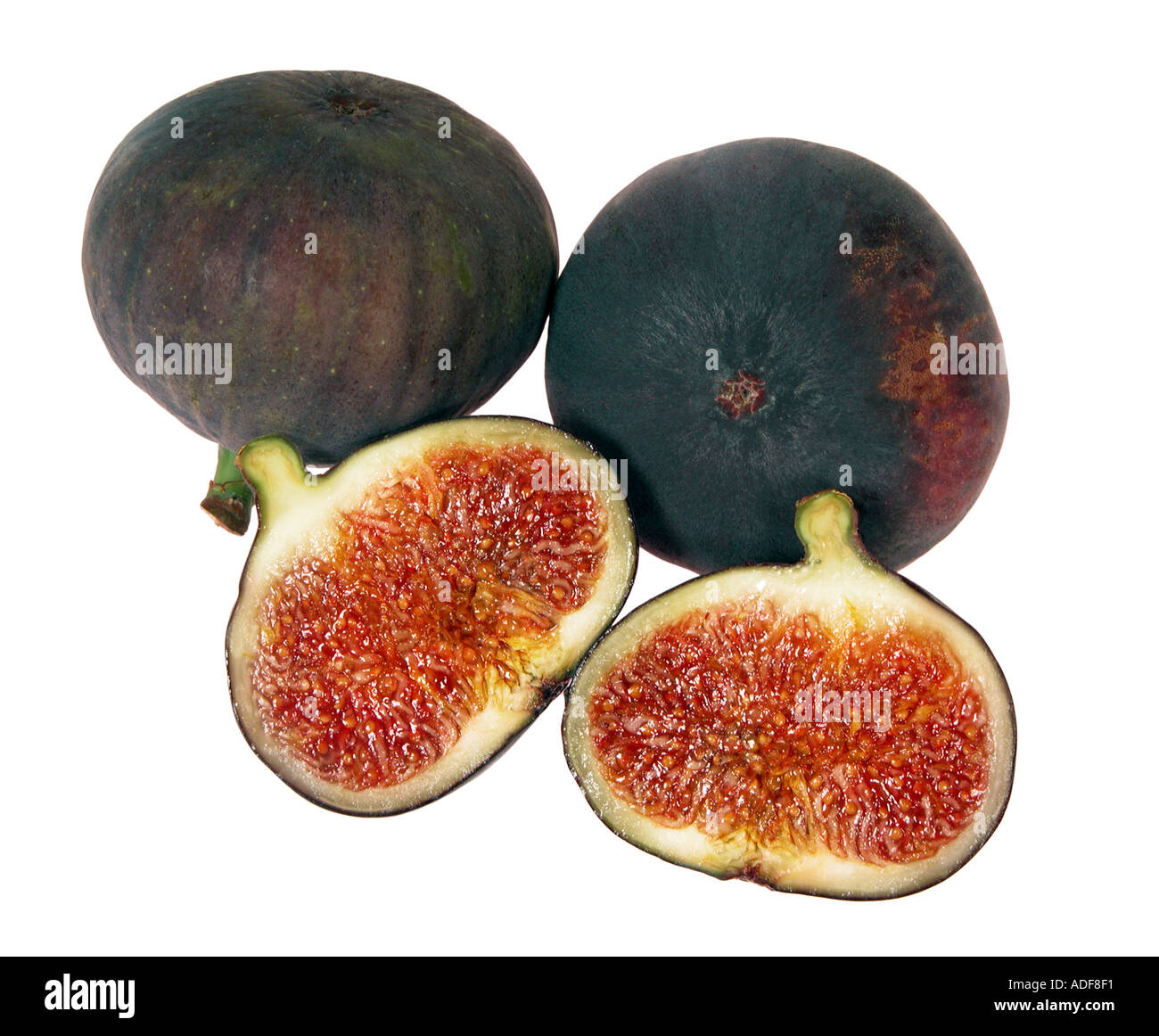 fresh dark blue black turkish fig figs cut in half pieces cut out ...