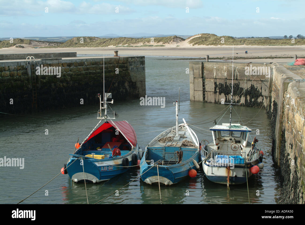 Fishing Boat and Cobles at Beadnell Harbour Northumberland England ...