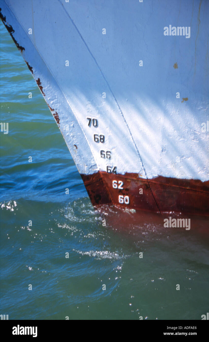 hull of boat in water detail Stock Photo - Alamy