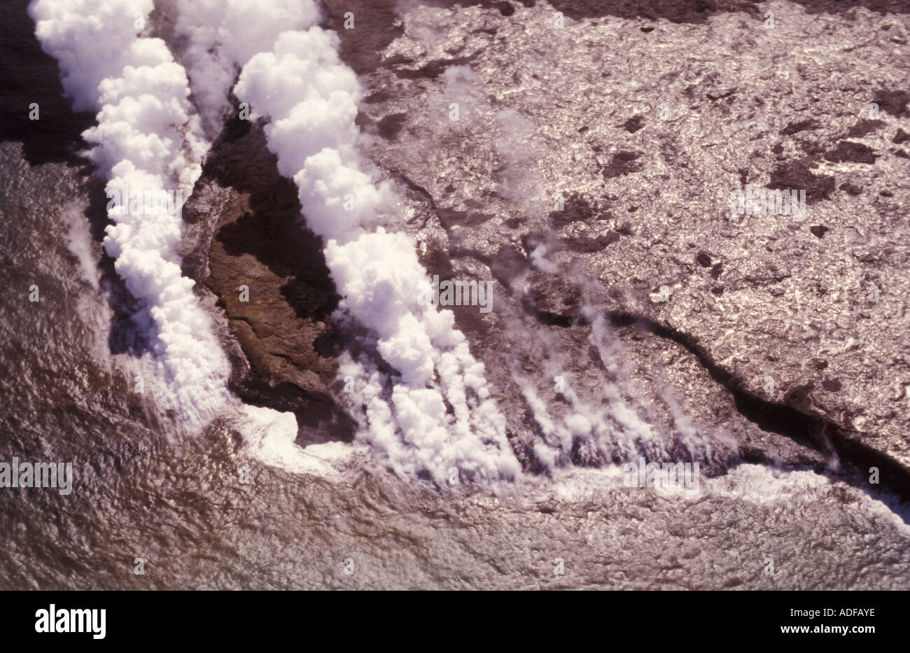 Lava falls into the sea Volcanoes national park Big Island Hawaii ...