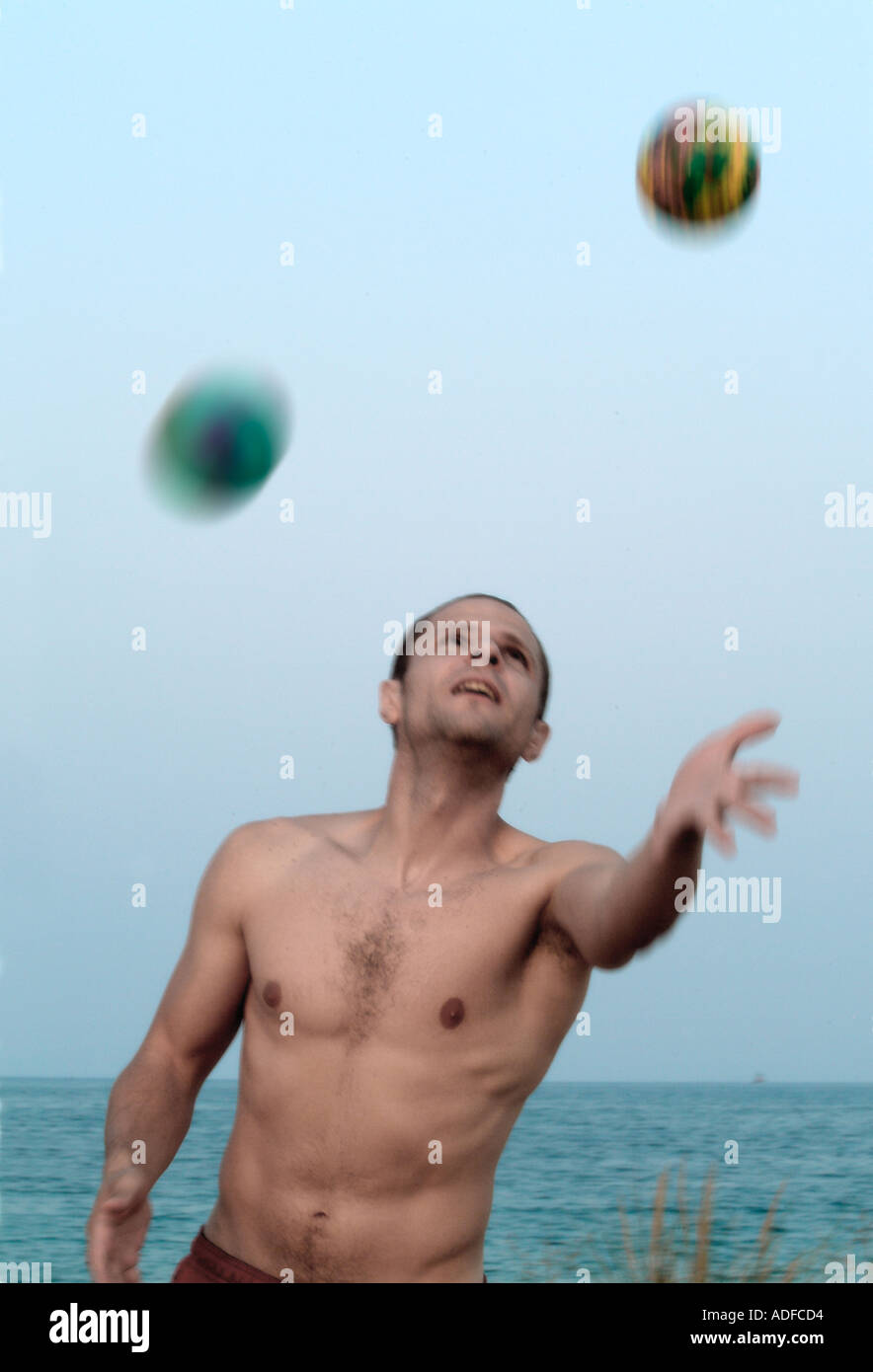 Man juggling objects hi-res stock photography and images - Alamy