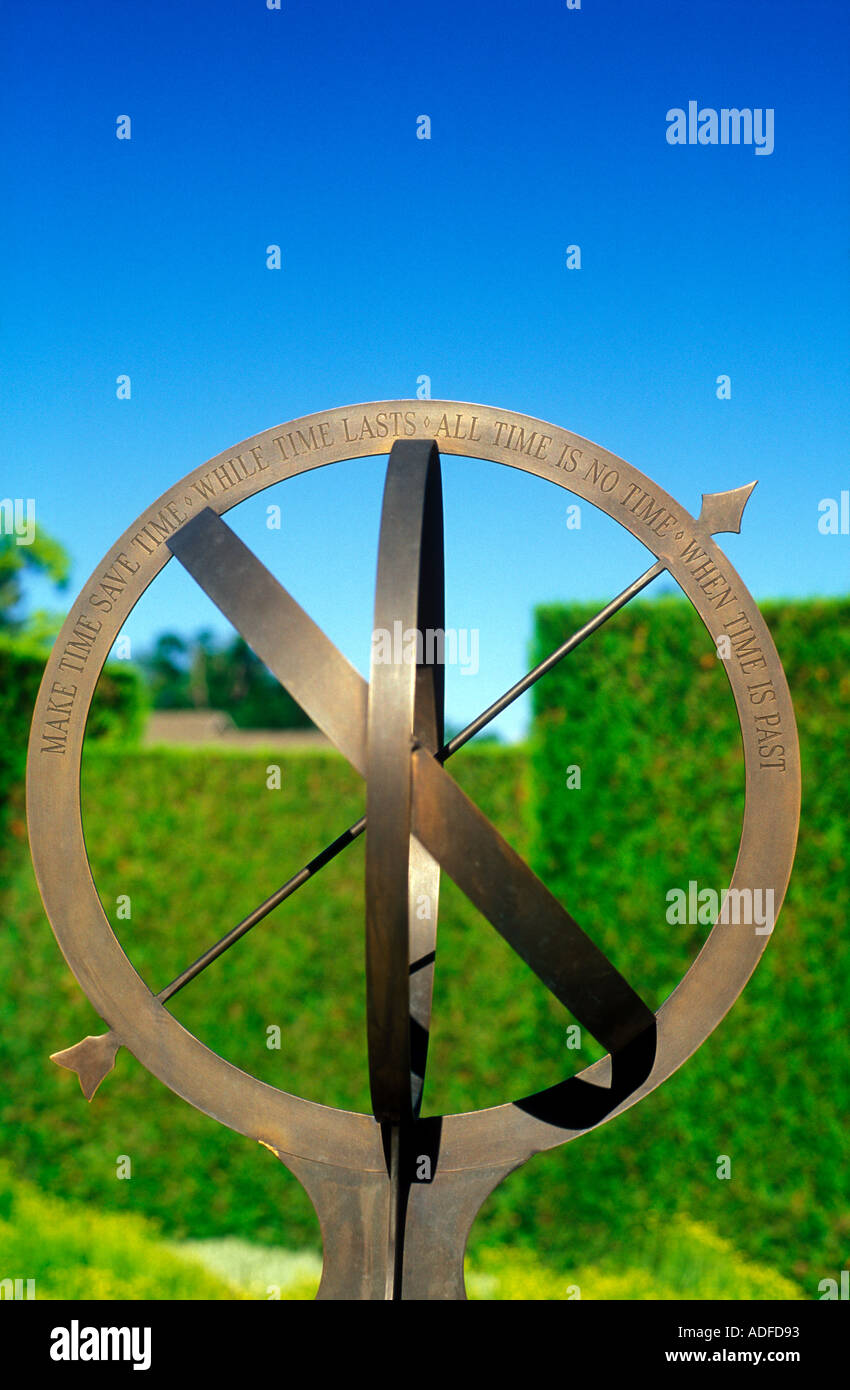 Sundial in a garden setting Stock Photo - Alamy