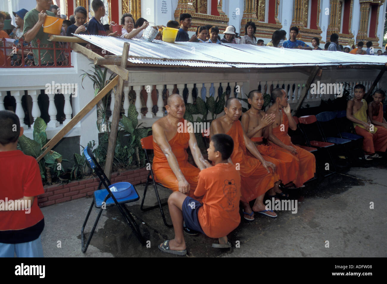 monk washing during Thai new year festival Stock Photo - Alamy