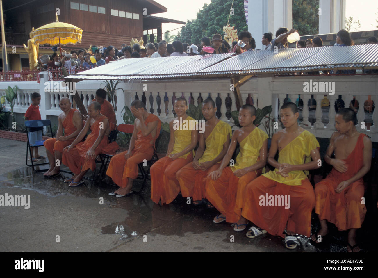 monk washing during Thai Songkran festival Stock Photo - Alamy
