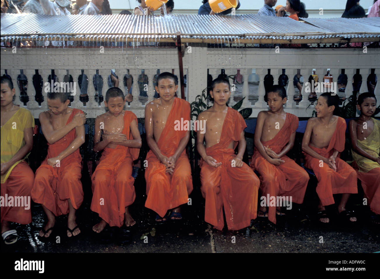monk washing during thai songkran festival Stock Photo - Alamy