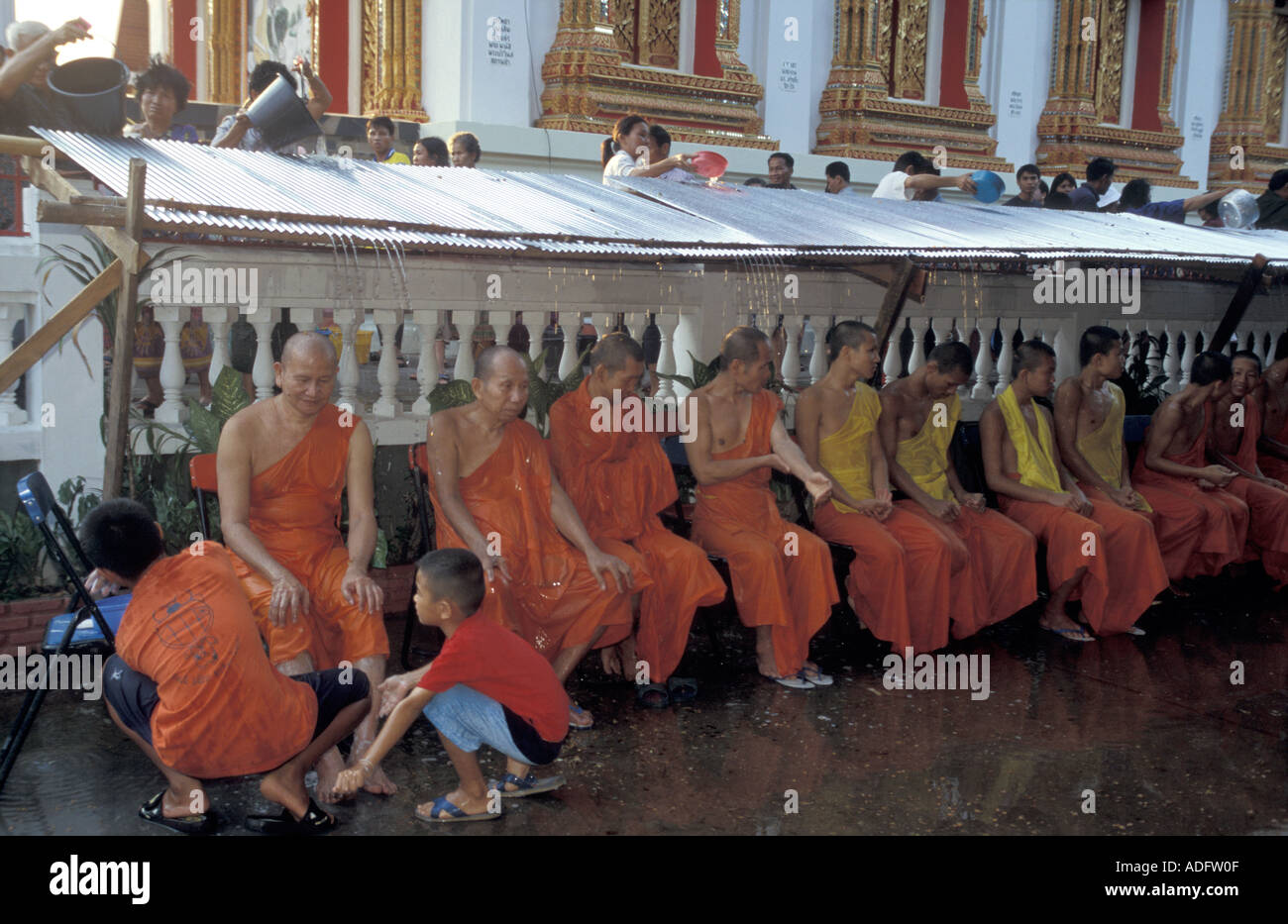 monk washing during Thai songkran new year festival Stock Photo - Alamy