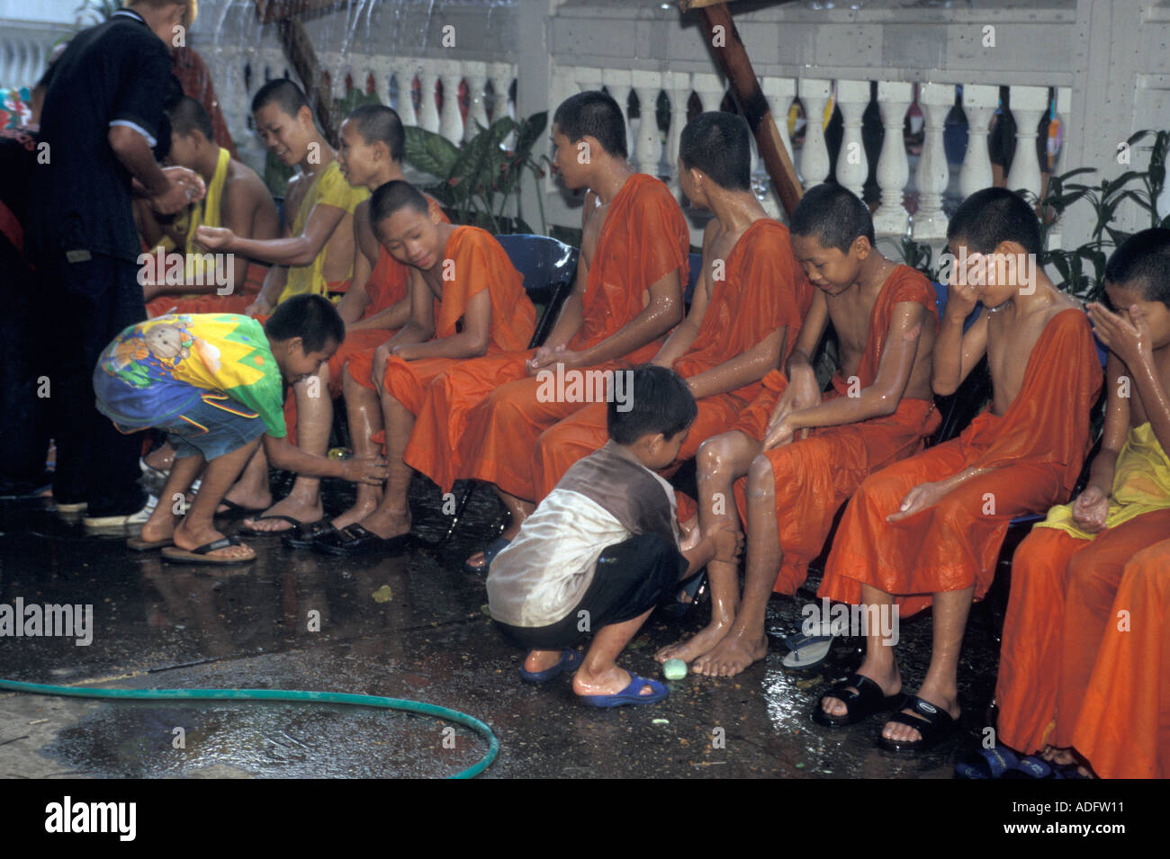 monk washing during songkran thai new year festival Stock Photo - Alamy