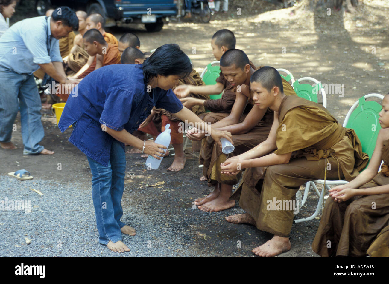 monk washing at songkran new year festival Thailand Stock Photo - Alamy