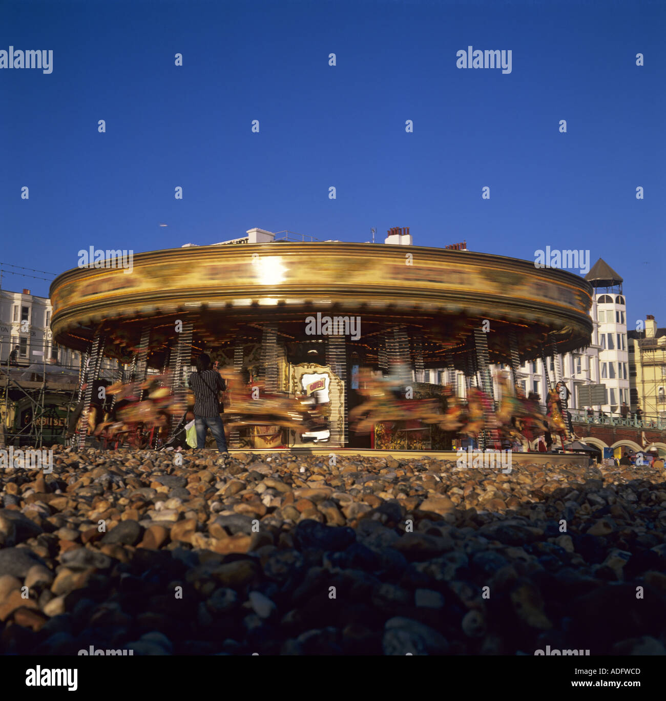 The merry go round or carousel on Brighton sea front caught in action ...