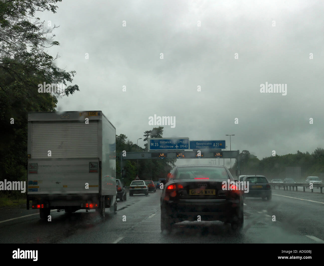Rain on M25 Motorway Heavy Traffic Speed Restriction Signs 40 mph at ...