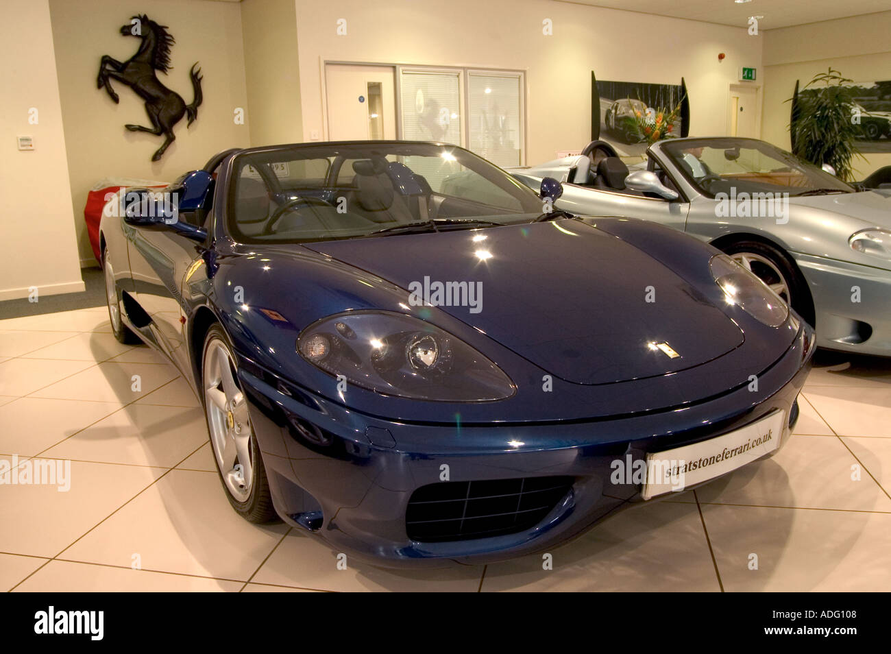 Ferrari modern car expensive symbol new Stock Photo - Alamy