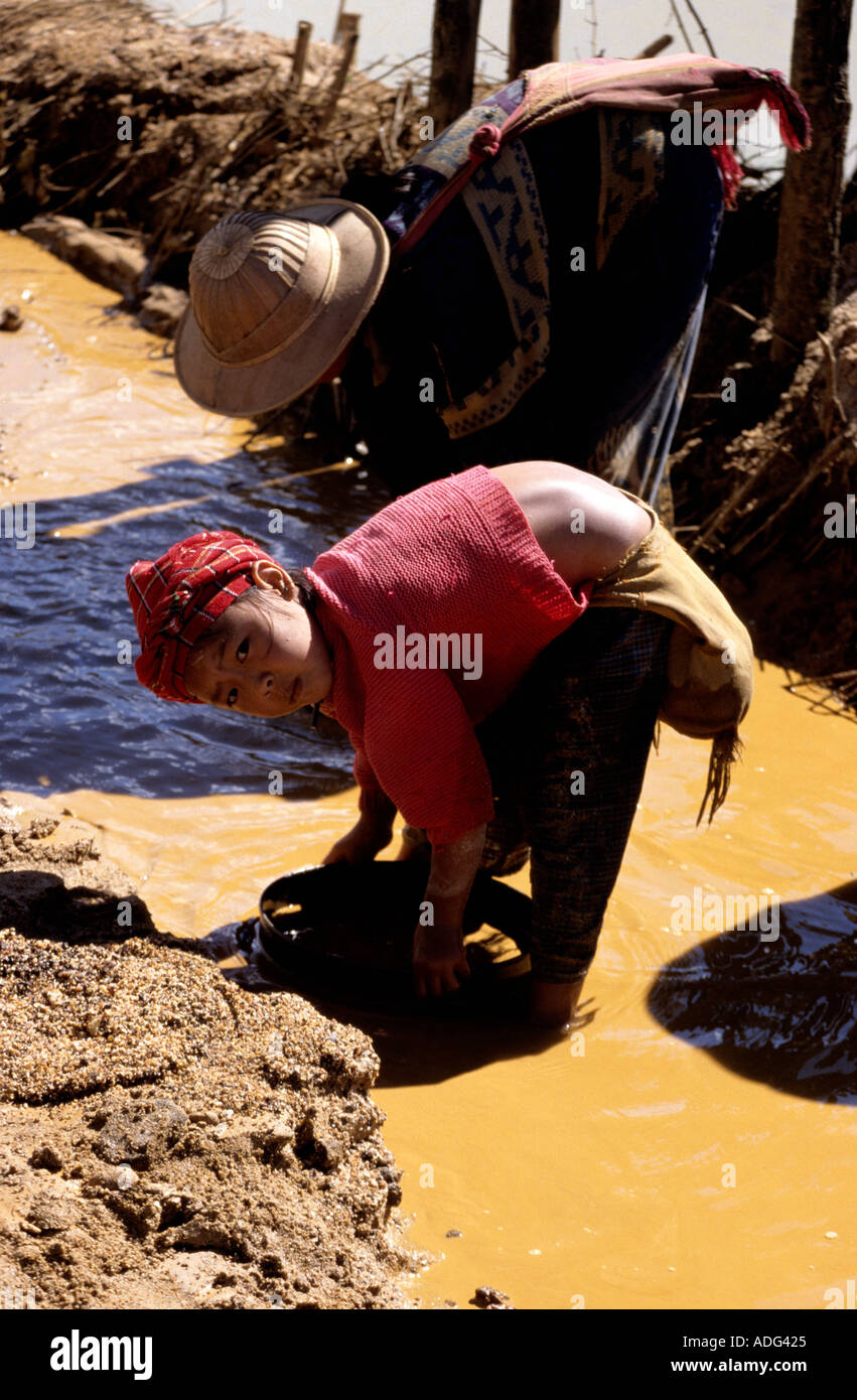 Child Labour. Boy panning for Rubies at Mogok in Burma ,Myanmar Stock ...