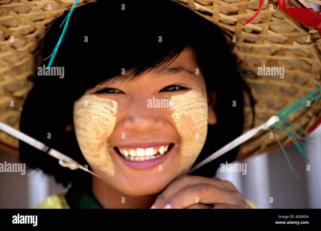 pretty smiling young girl in bamboo hat at the Shwedagon Pagoda,Yangon ...