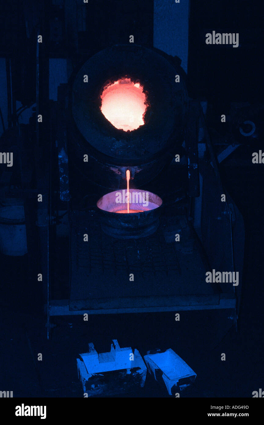 Crucible pouring molten gold Buhemba Gold Mine Western Tanzania Africa ...