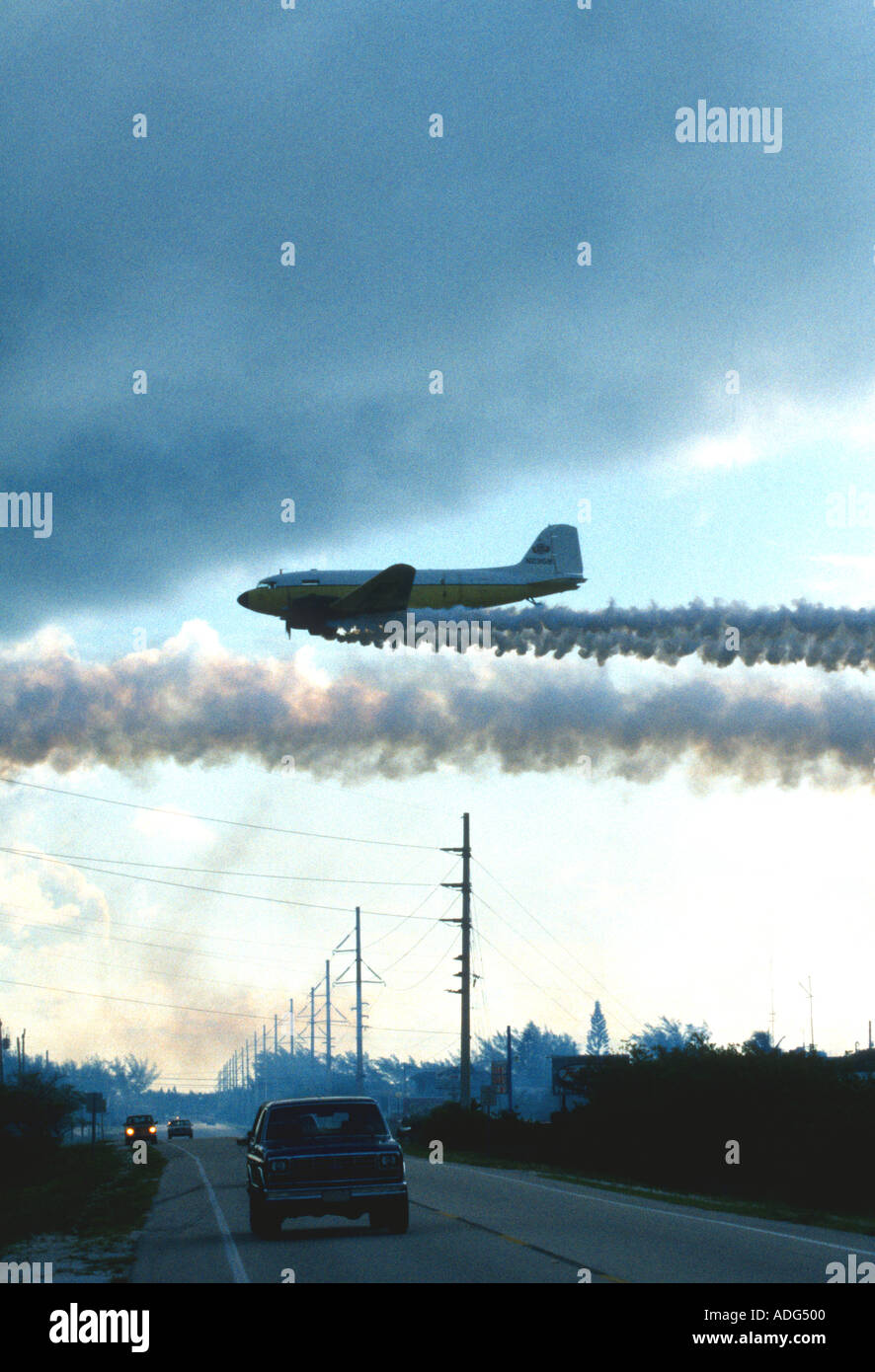 Aircraft spraying petrol based pesticides Florida Keys USA Stock Photo ...