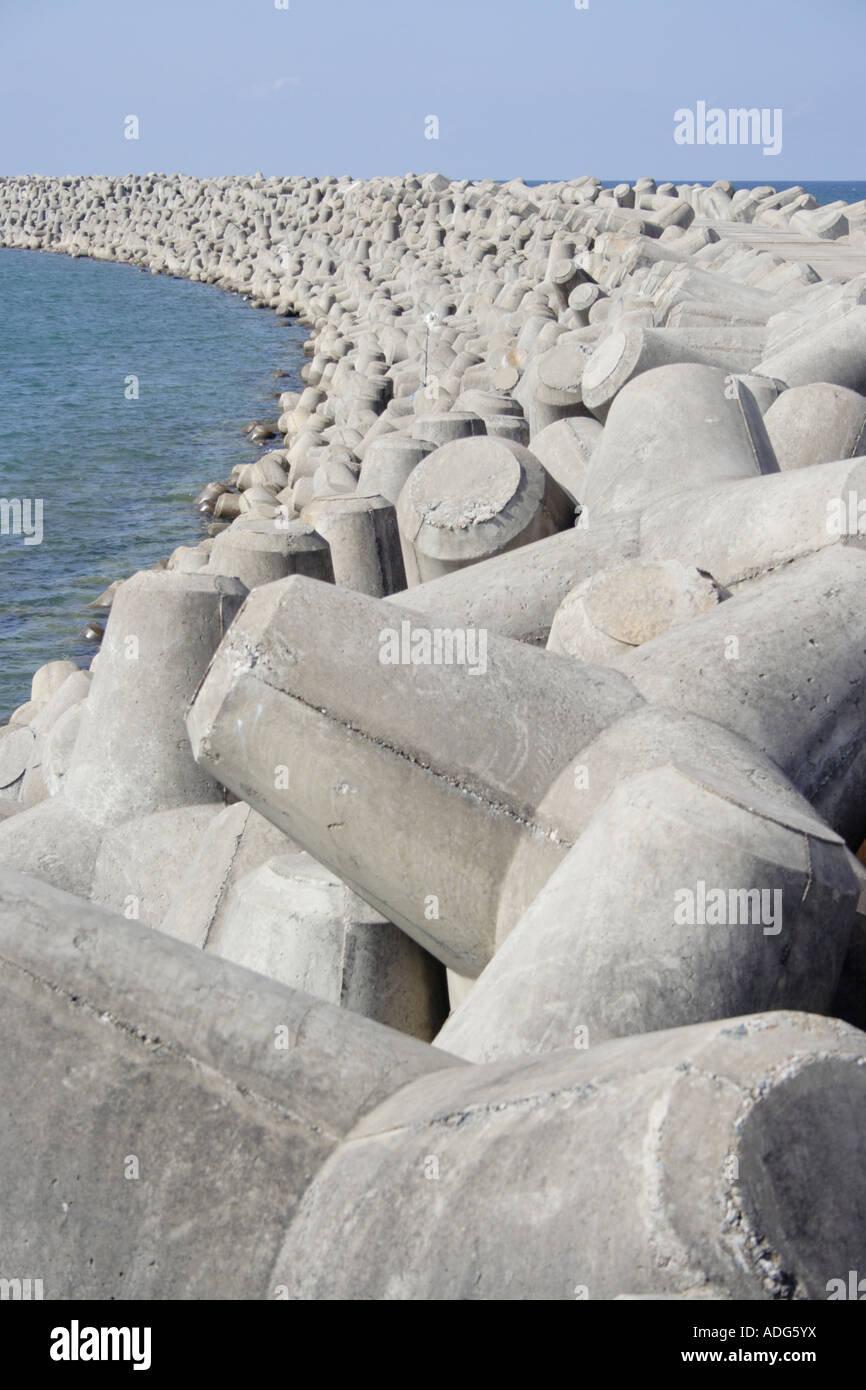 Tetra concrete block used for wave breaker in Malaysia Stock Photo - Alamy