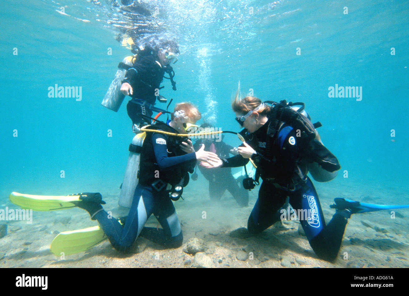 Boy age 13 years old practices buddy breathing in Junior Open Water ...