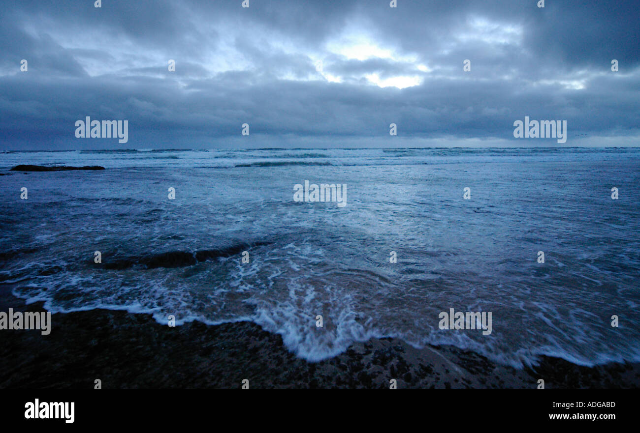 Sea edge with heavy sky Northumberland England Stock Photo - Alamy