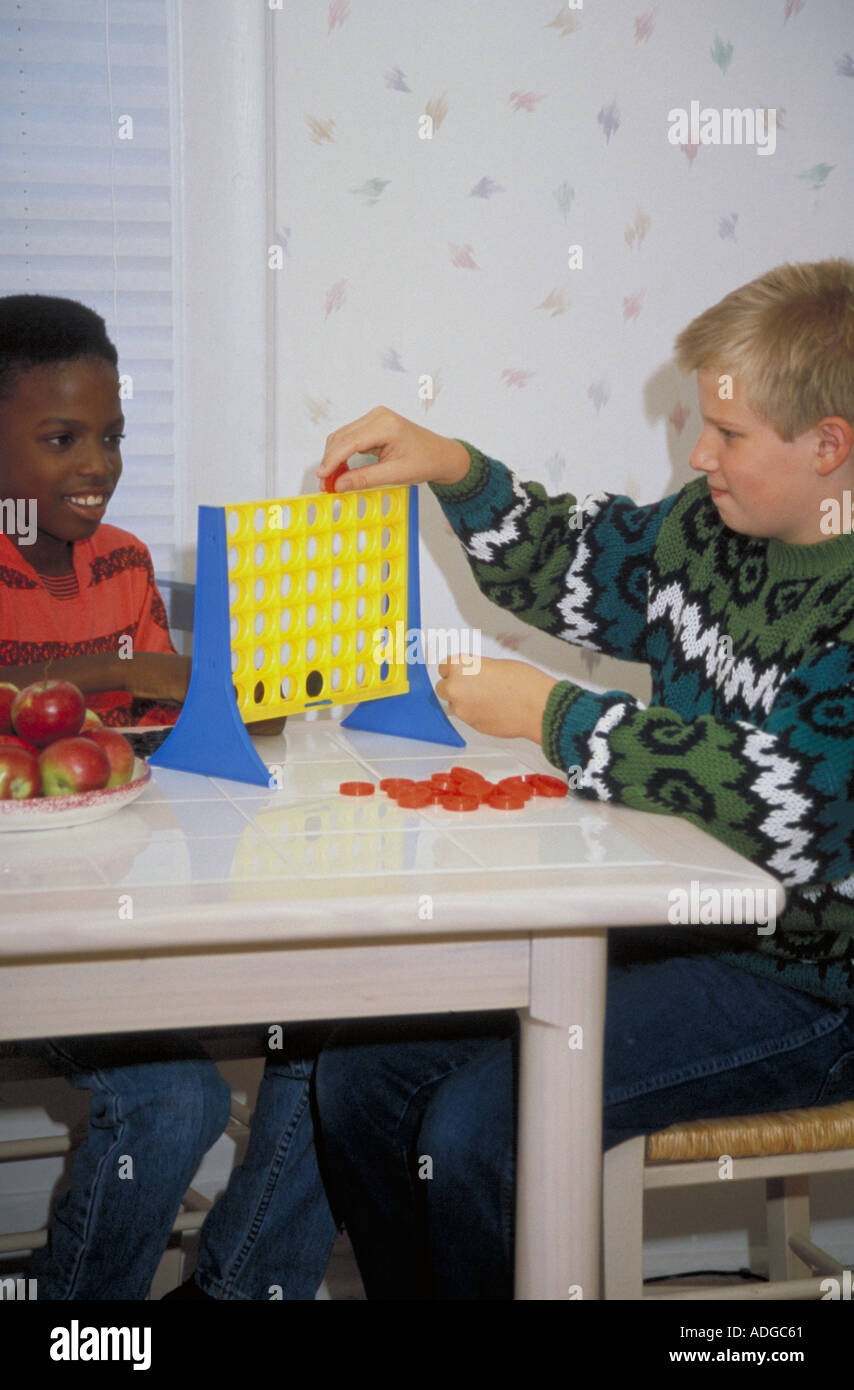Boys Playing Boardgame Stock Photo - Alamy