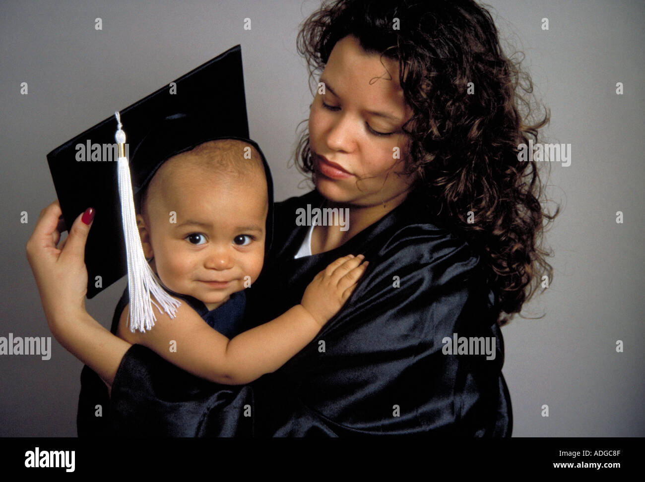 Mom Graduate with son Stock Photo - Alamy