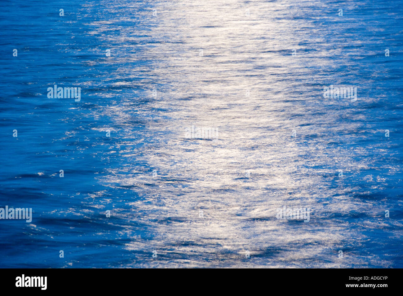 Ocean with reflection of sun on water surface Stock Photo - Alamy