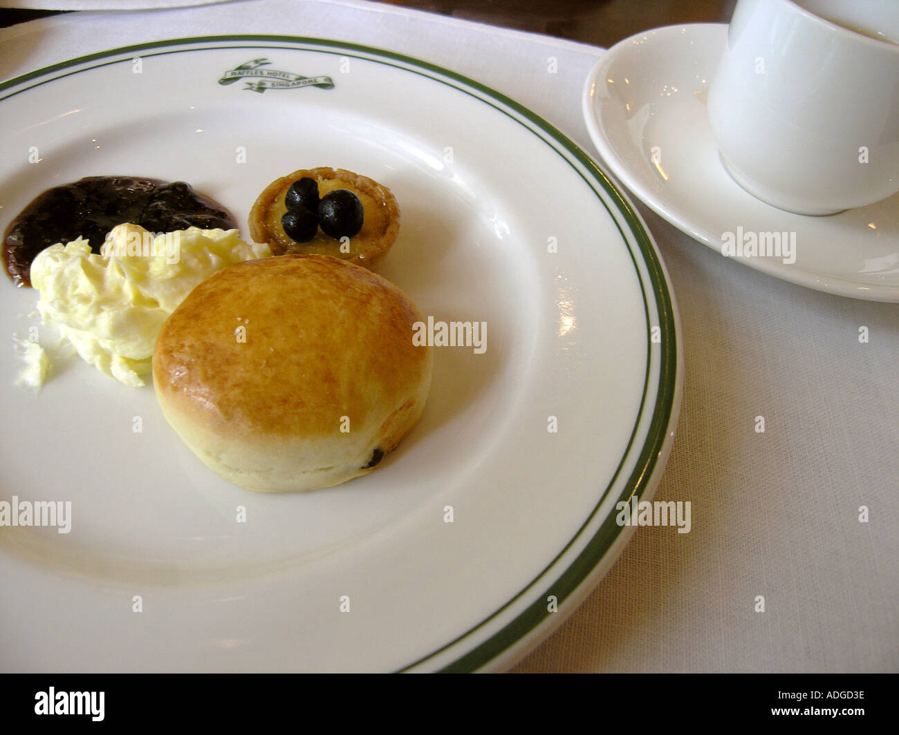 Traditional cream scone forming part of the afternoon high tea buffet ...