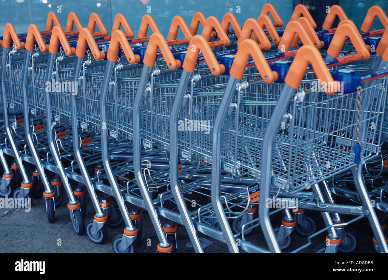 Row of Sainsburys supermarket shopping trollies, UK Stock Photo - Alamy