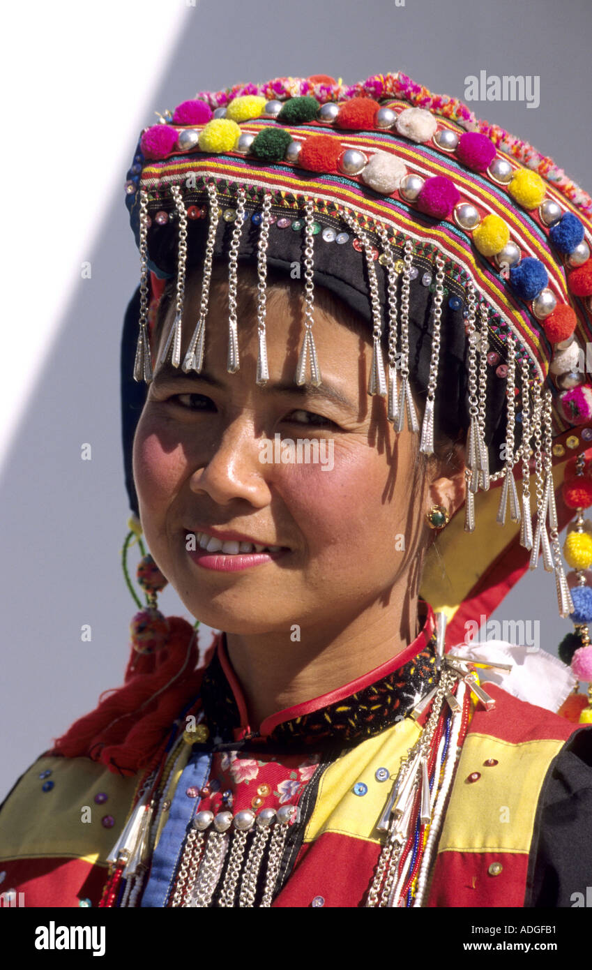 Portrait of a young Kachin tribal woman at a Manao (festival) in ...