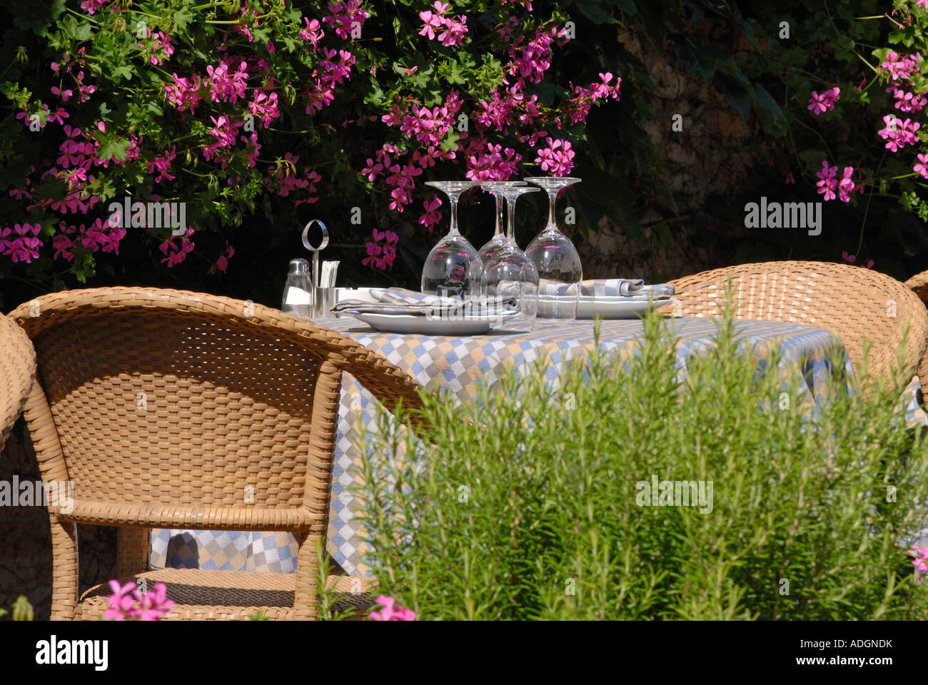 Classic set outdoor restaurant dining table with flowers in Italy Stock ...